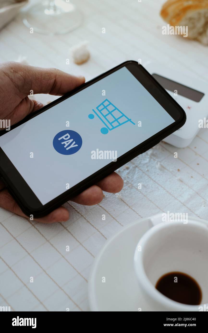 Paying a bill on the phone hi-res stock photography and images - Alamy
