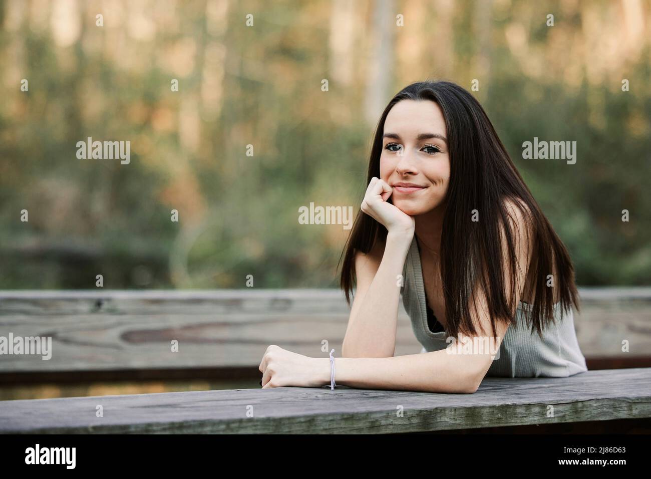 Leaning on bridge railing hi-res stock photography and images - Alamy