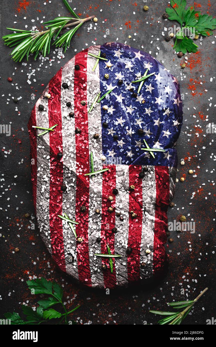 Beef steak with American flag seasoned with salt, pepper and fresh ...