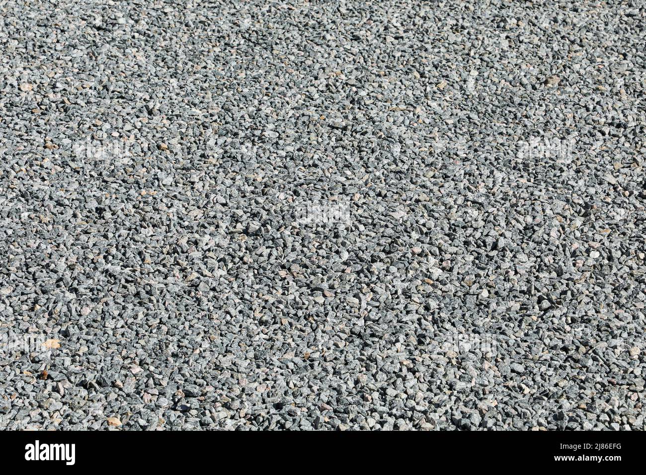 Sidewalk only with compacted crushed stone, in a regular and flat ...