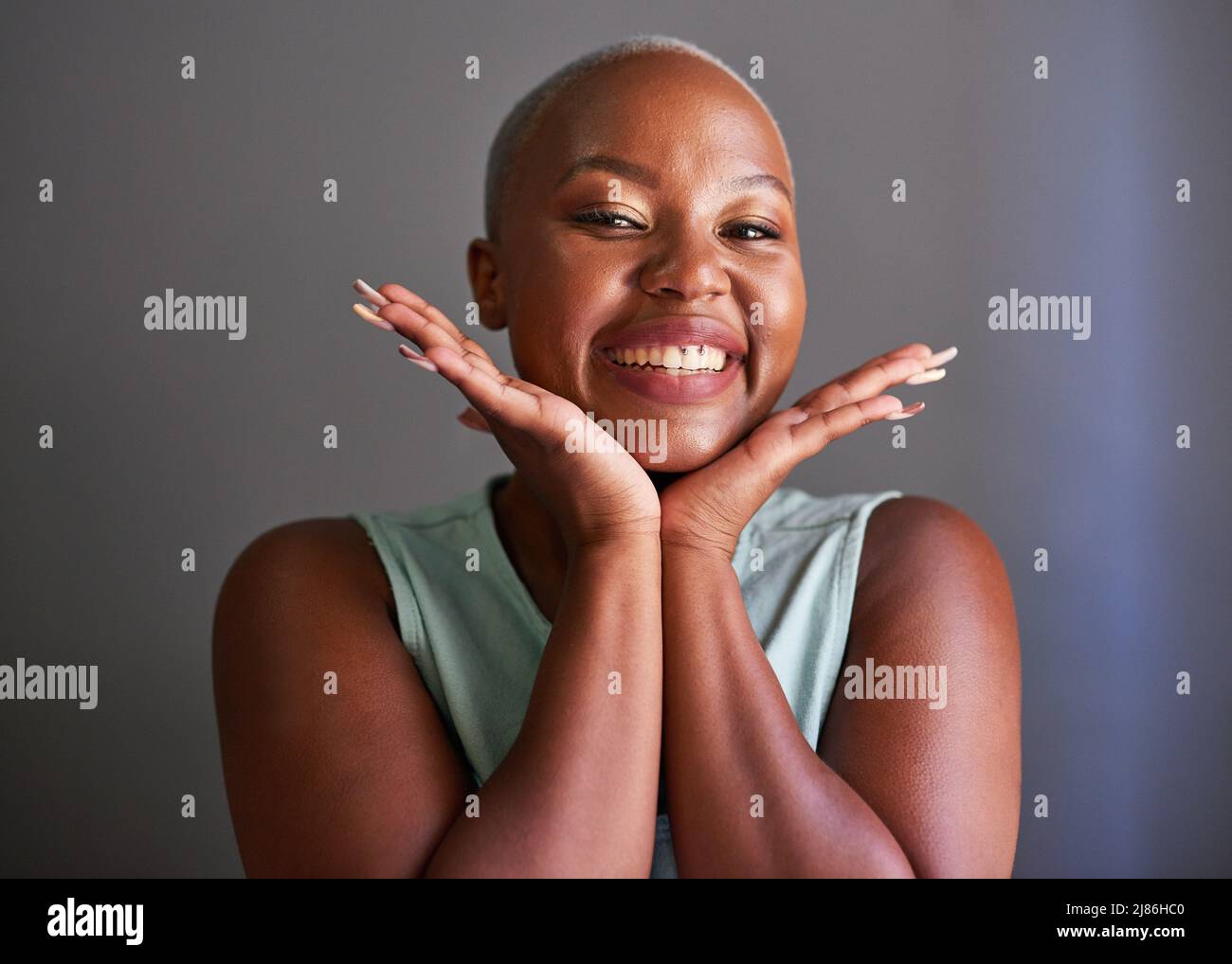 Hands under face hi-res stock photography and images - Alamy