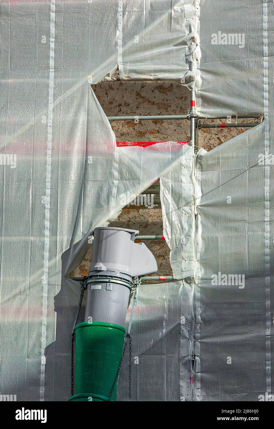 Plastic tube for removing of waste material during the renovation of ...