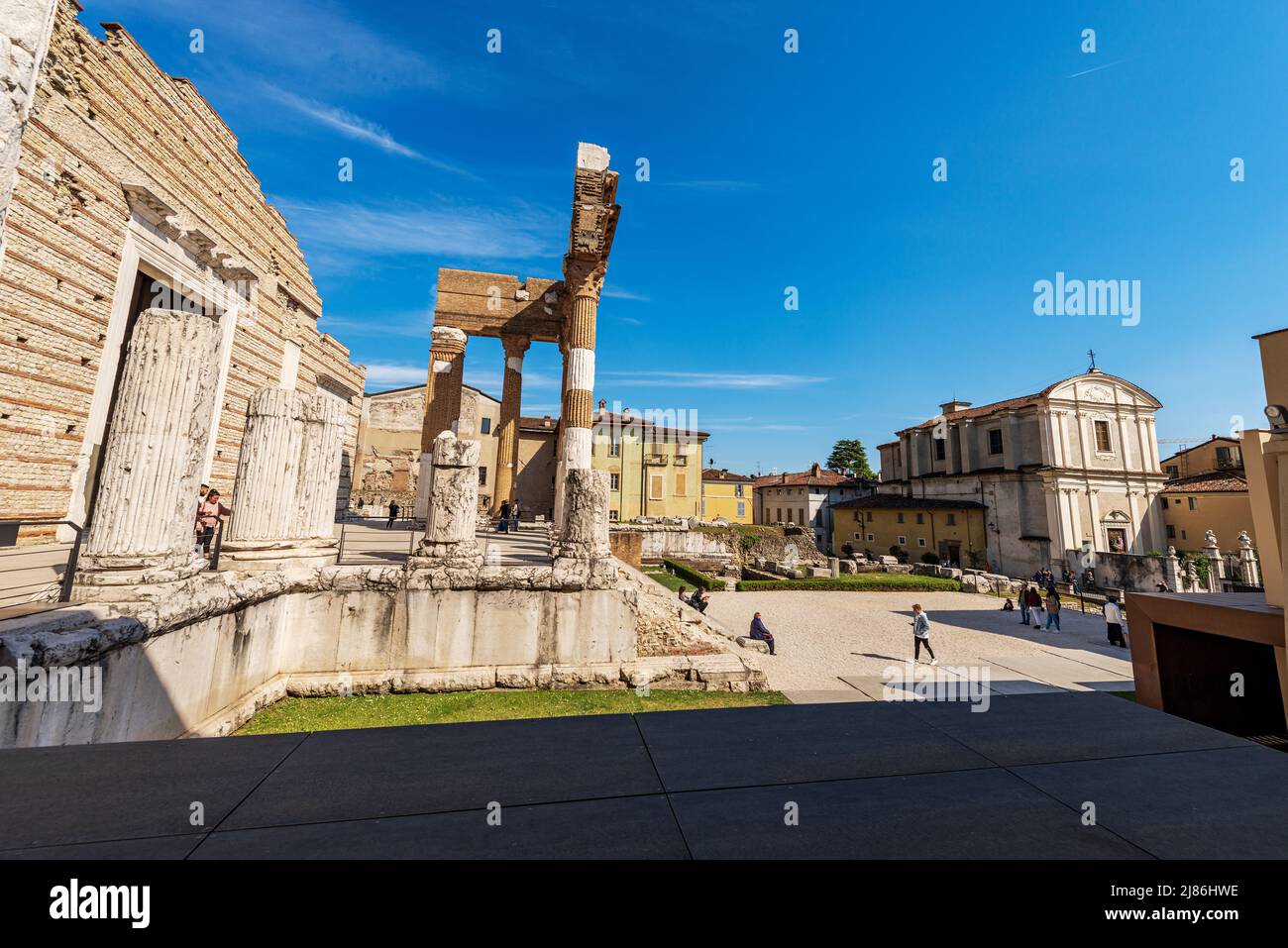 Ancient ruins of the Capitolium Roman Temple (Tempio Capitolino) with ...