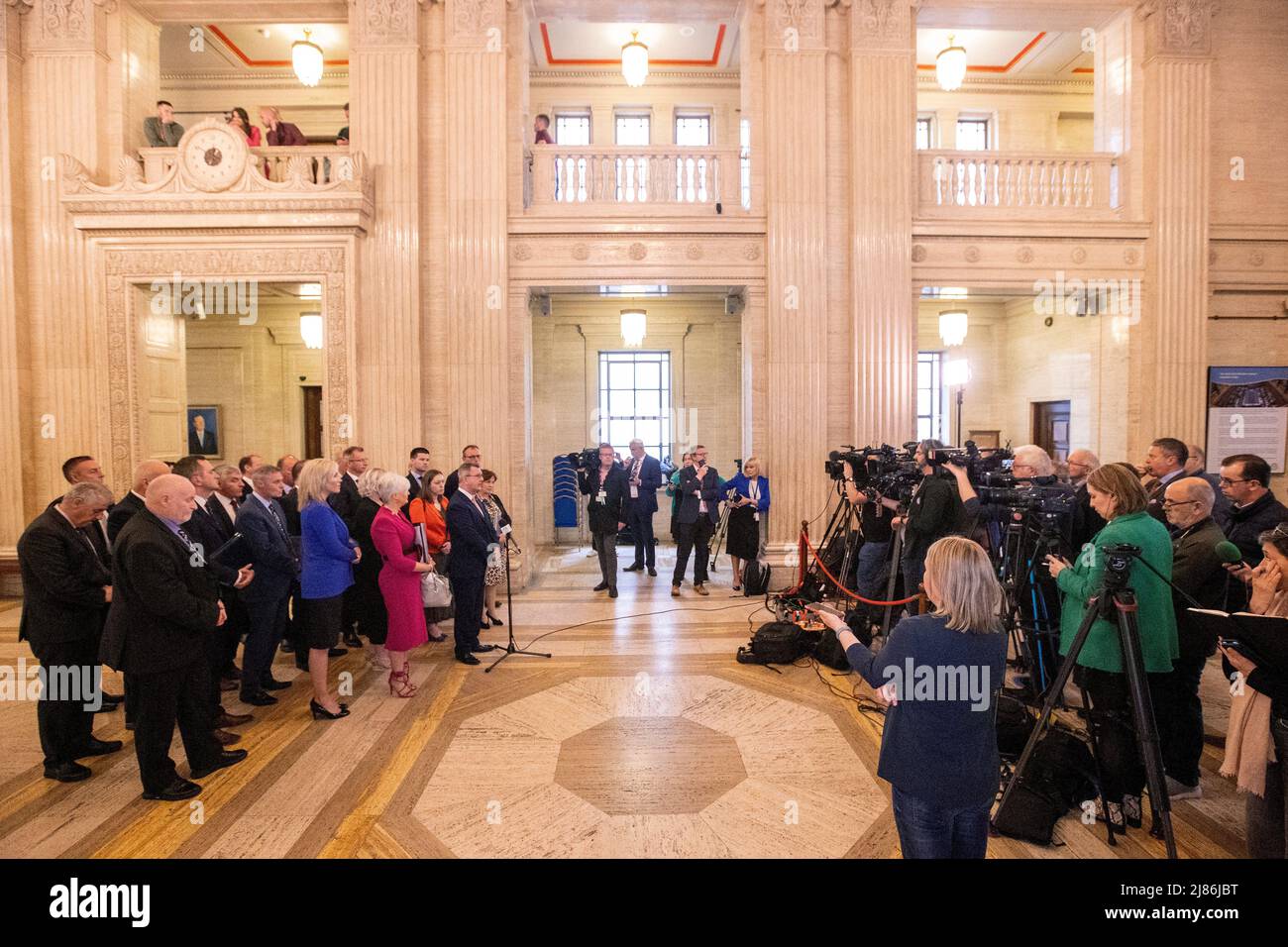 DUP Leader Sir Jeffrey Donaldson with party colleagues, speaking at the ...