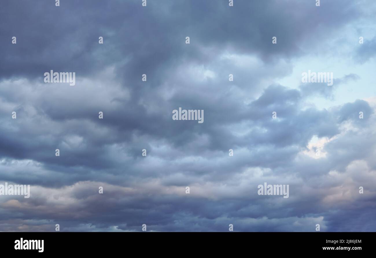 Evening sky with dark heavy clouds - as if storm coming Stock Photo - Alamy