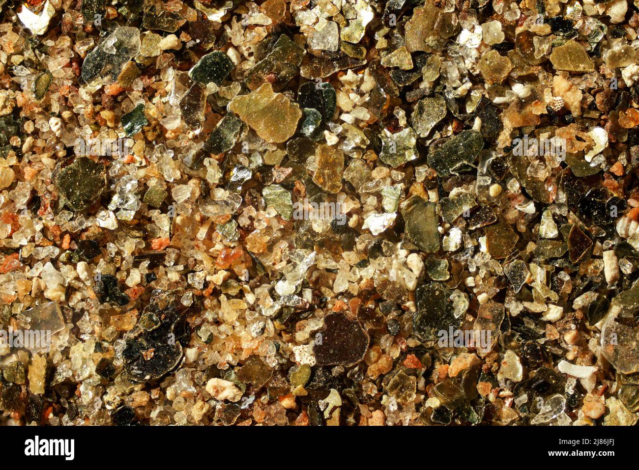 Sea sand (Malindi beach, Kenya) with golden like particles few ocean ...