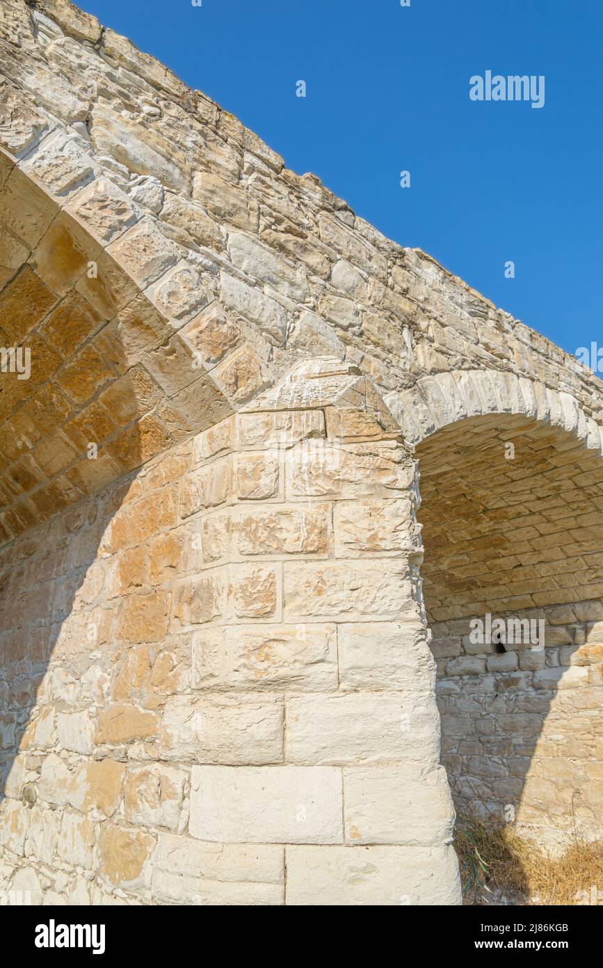 A medieval bridge built of coursed stone in the village of Alethriko on ...