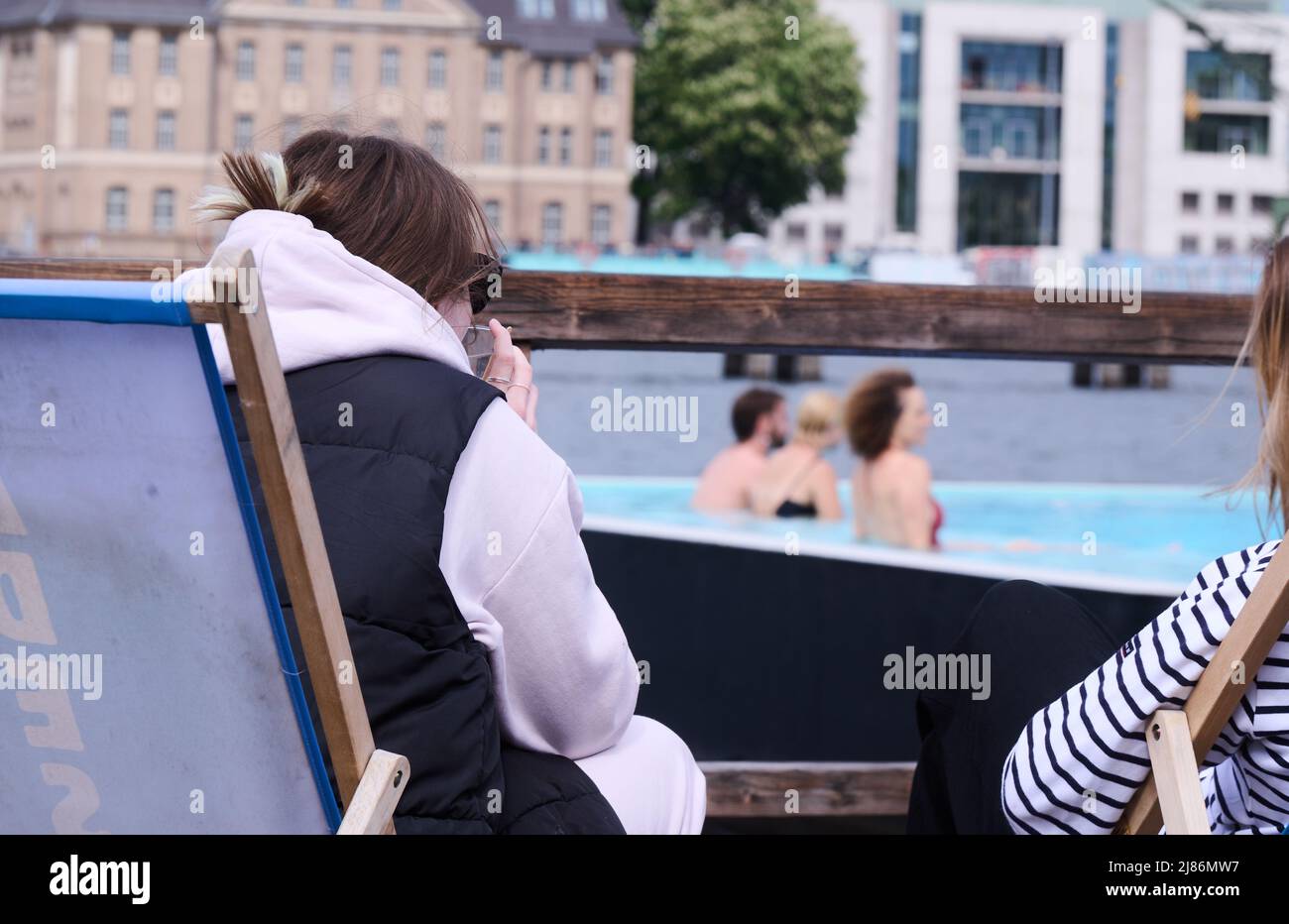 Berlin, Germany. 13th May, 2022. In the bathing ship, people swim in ...