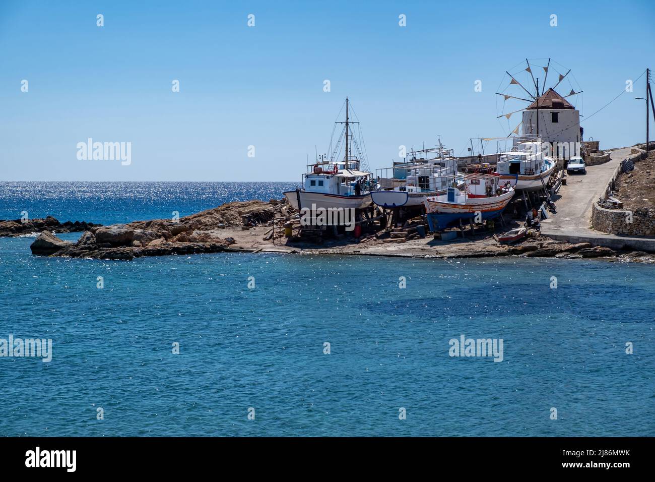 Greece. Ano Koufonisi island, Cyclades. Traditional windmill over old ...