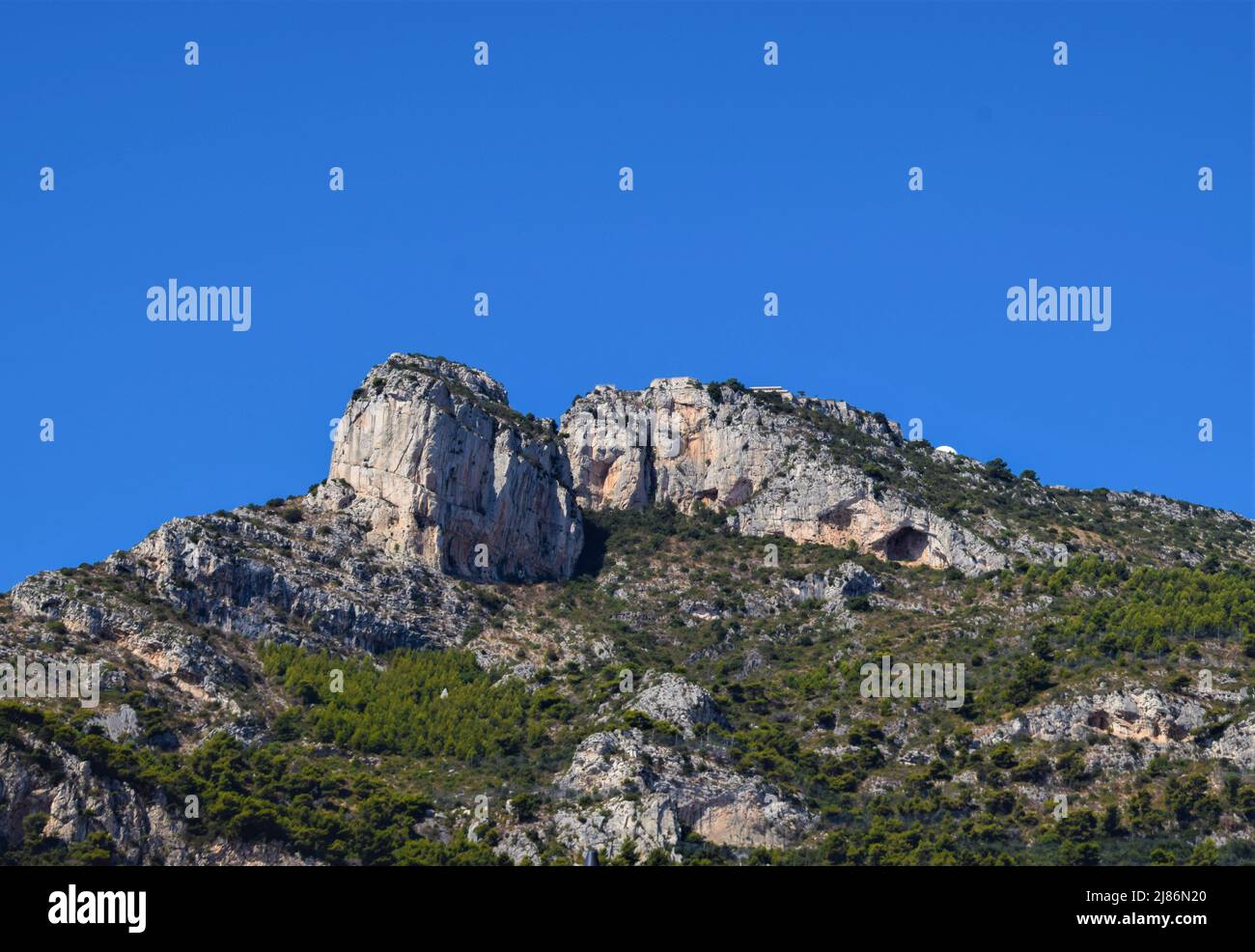 Cap d'Ail marina and Tete de Chien rock promontory, South of France ...