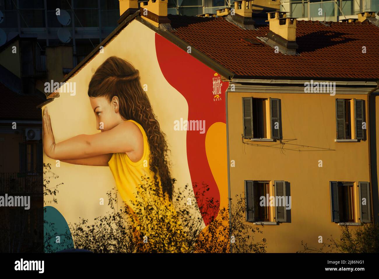 Milan, Lombardy, Italy: old and new buildings with mural painting Stock ...
