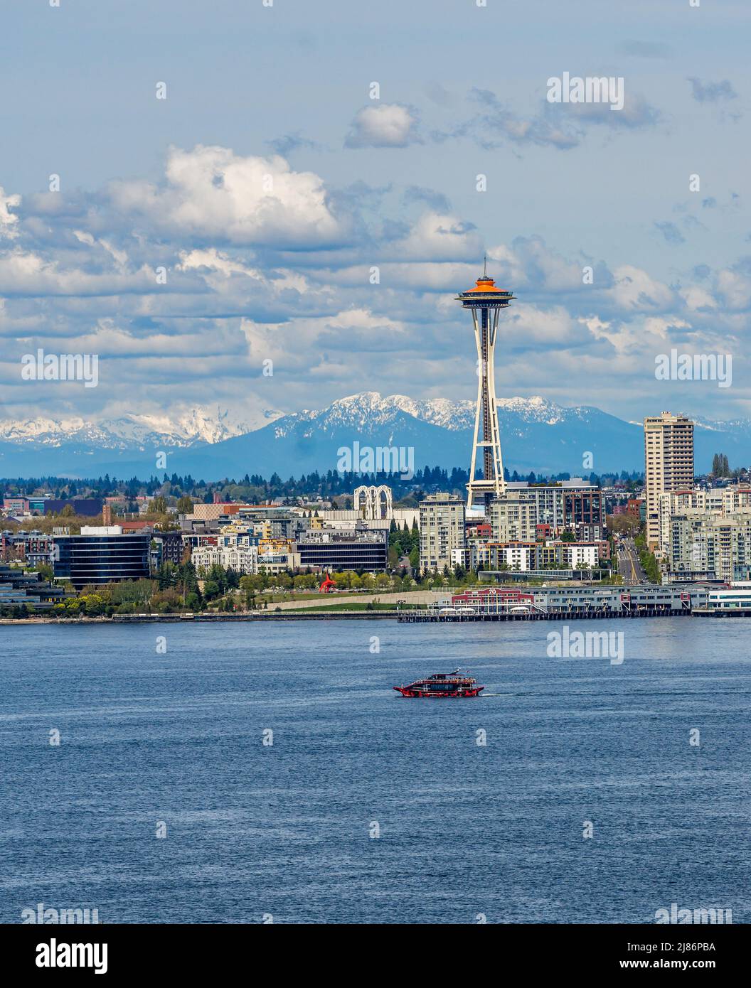 Cascade Mountain can be seen behind the Seattle skyline in Washington ...