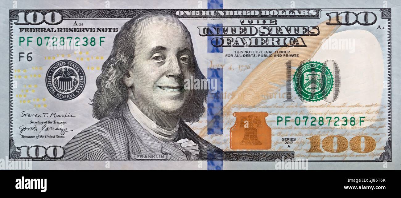 Benjamin Franklin smiling on 100 dollar banknote for design purpose ...