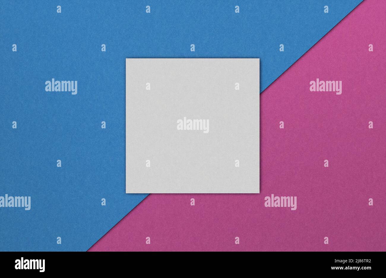 White square place for your text over diagonally split colour paper ...