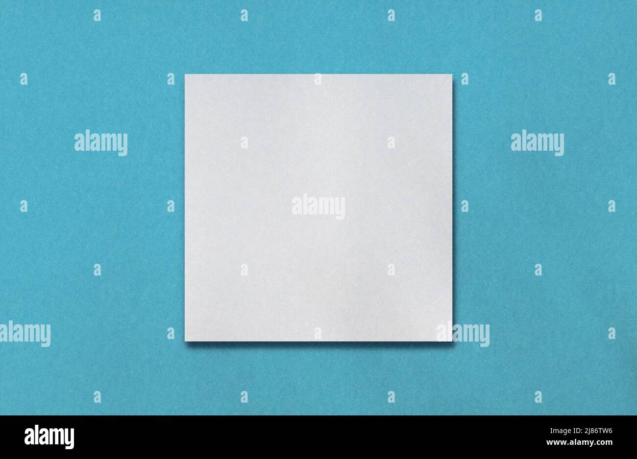 Blank white square or frame for your content on turquoise paper texture ...