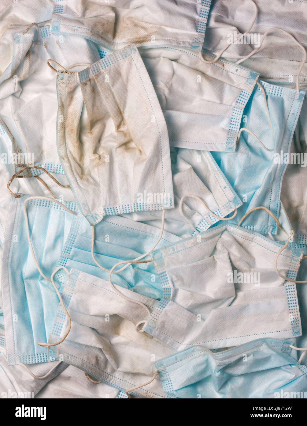 used dirty surgical protective face mask, blue disposable hygienic ...