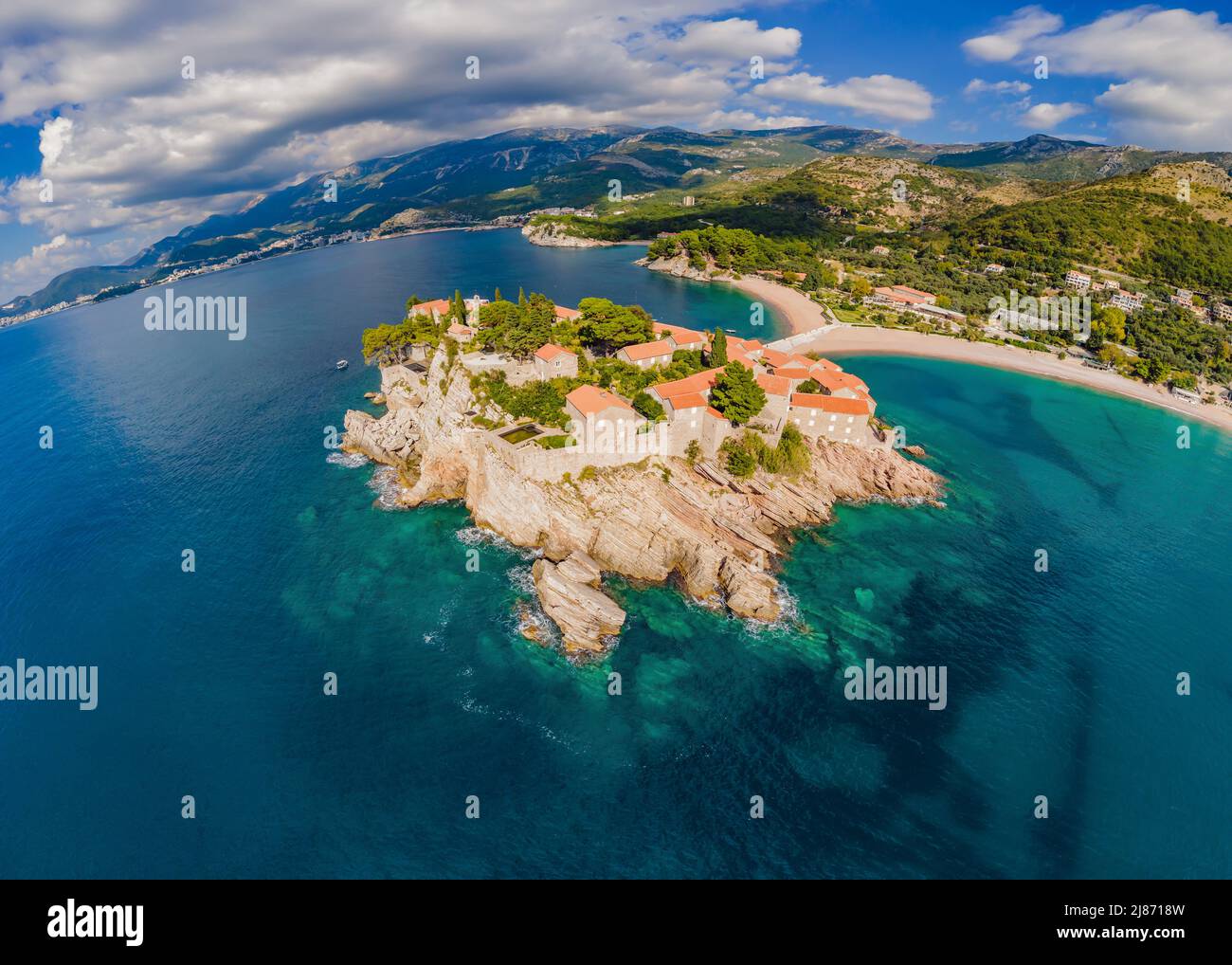 Aerophotography. View from flying drone. Panoramic view of Sveti Stefan ...