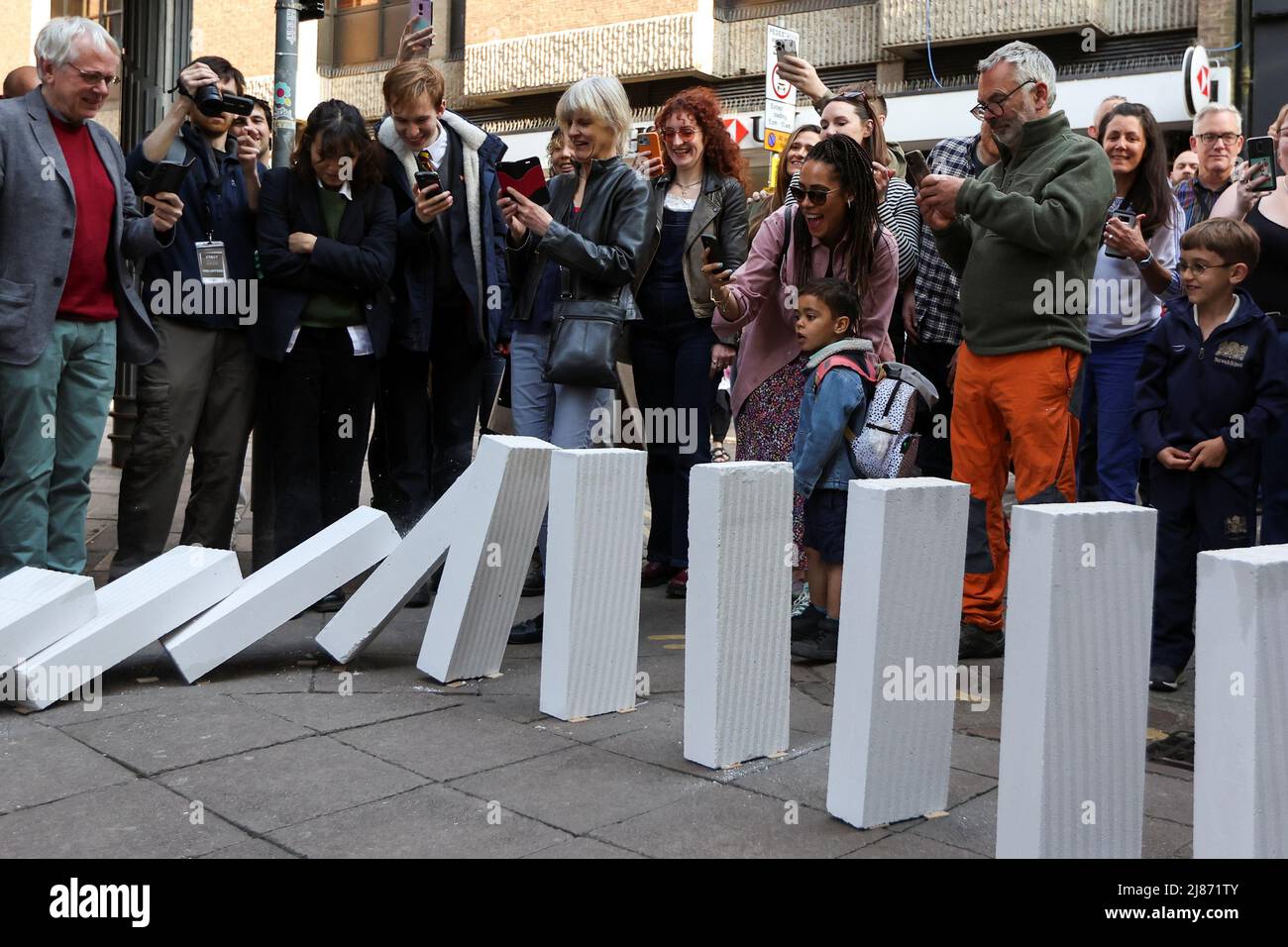 Domino toppling hi-res stock photography and images - Alamy