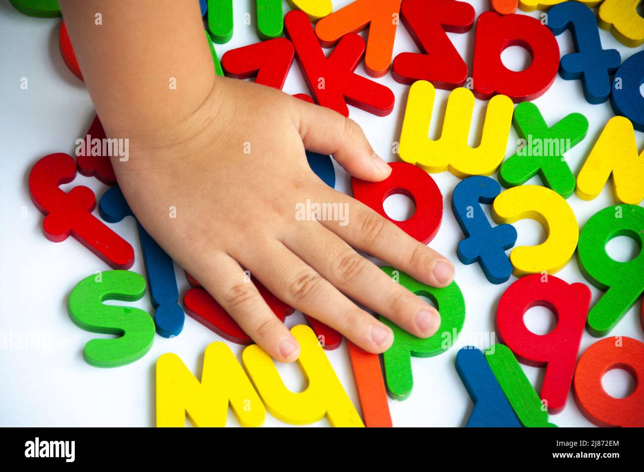 Close up hand writing alphabet hi-res stock photography and images - Alamy
