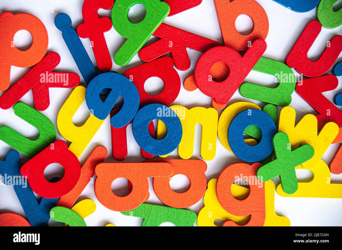 Wooden color letters on white background. Educational concept Stock ...