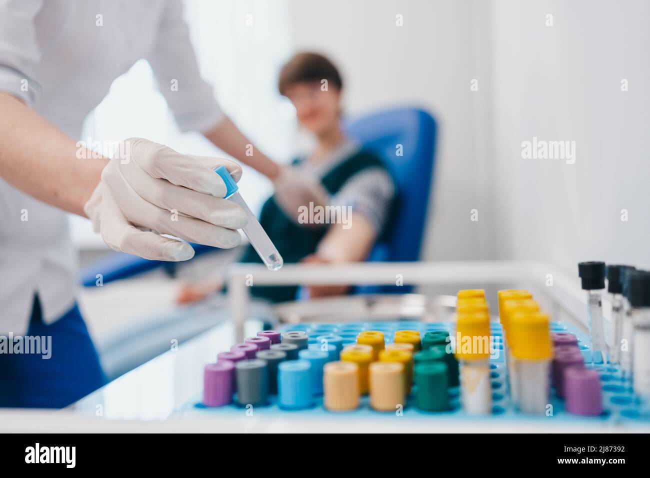 The patient takes a blood test at the clinic Stock Photo - Alamy