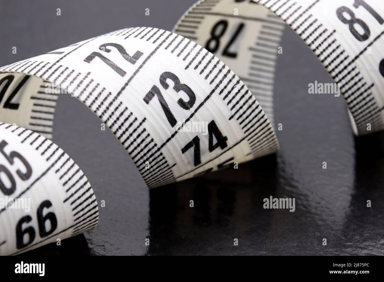 close-up measuring tape detail on background Stock Photo - Alamy