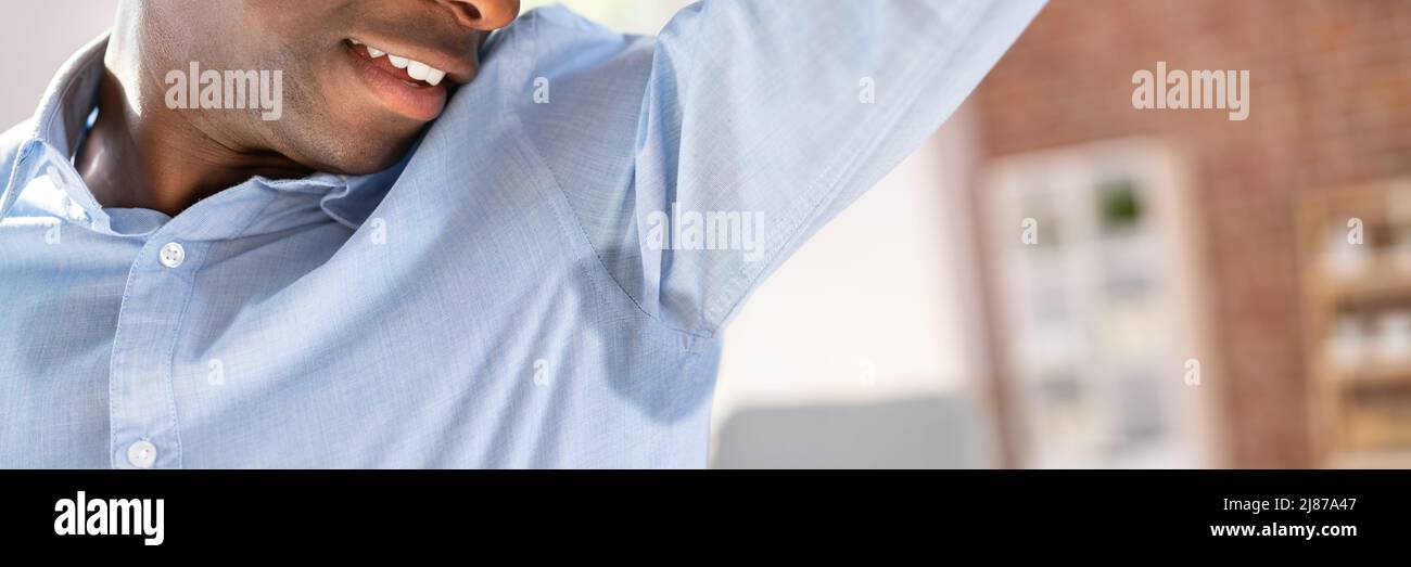 Mature Man Notices His Sweat Under Armpit Stock Photo - Alamy