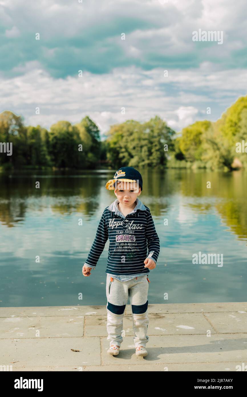 Small child stands hi-res stock photography and images - Alamy
