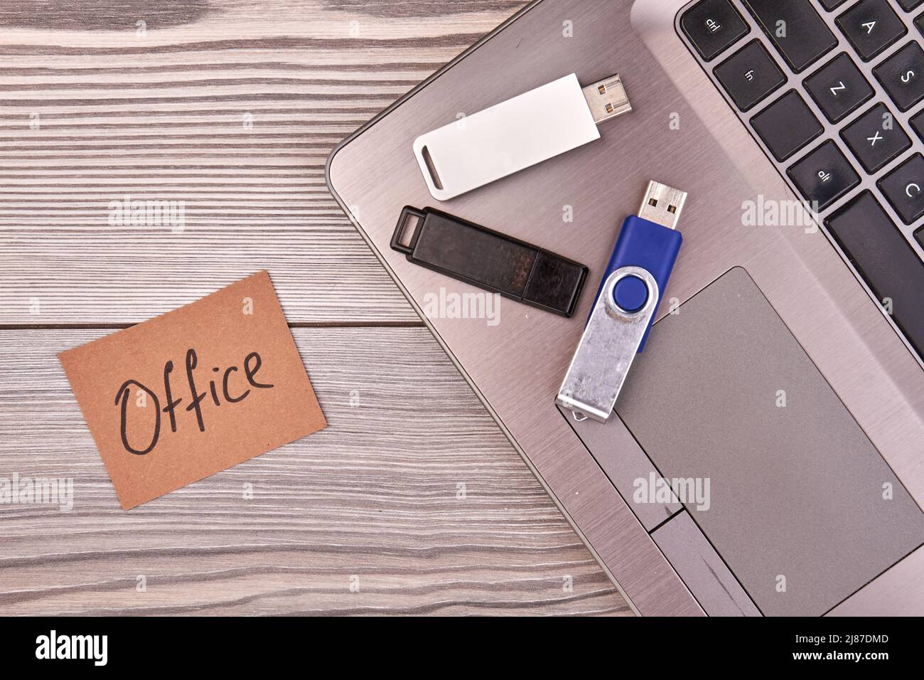 Word office with laptop pc and flash drives. Top view flat lay Stock ...