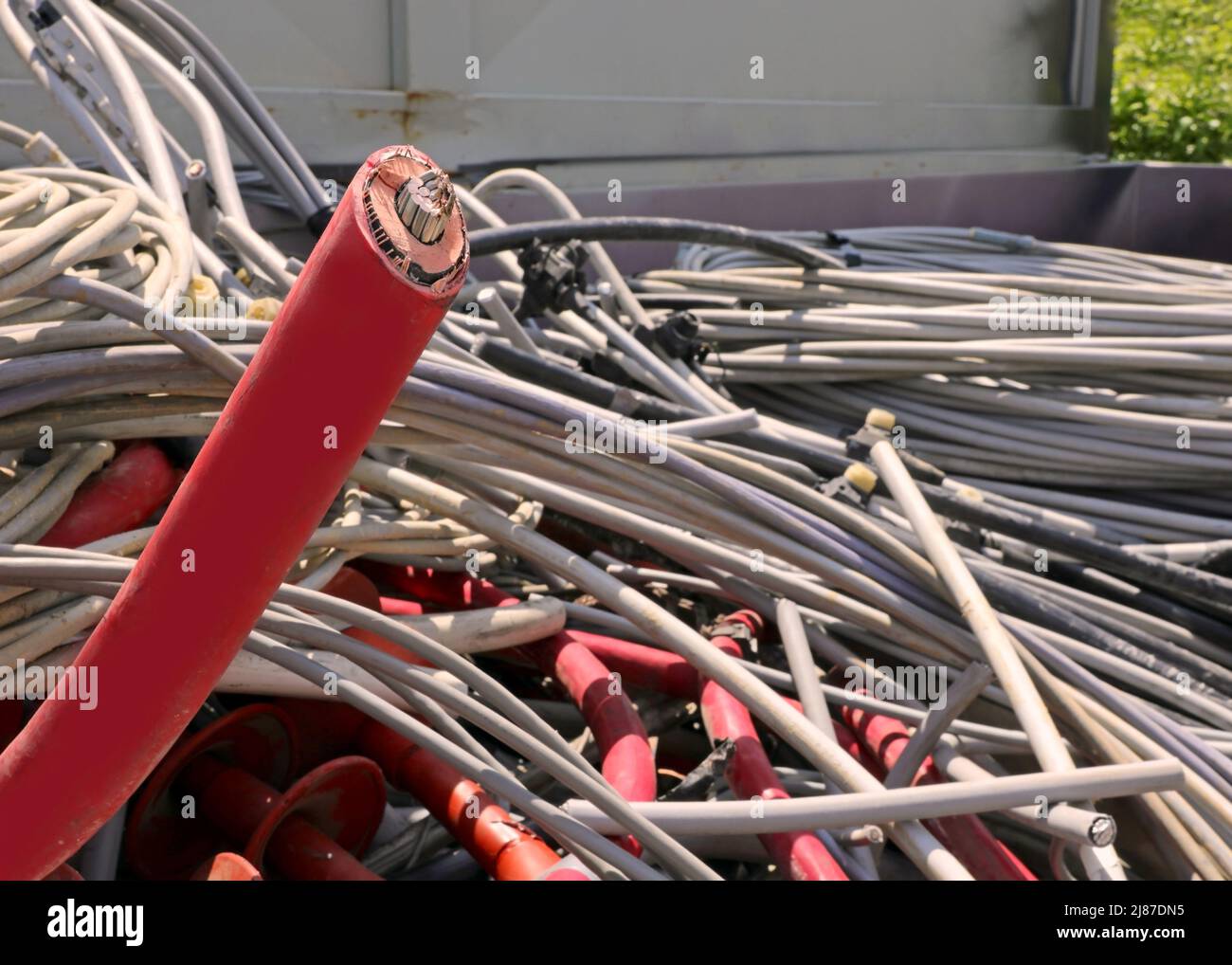 red electric cable for high voltage electricity and you see the inner ...