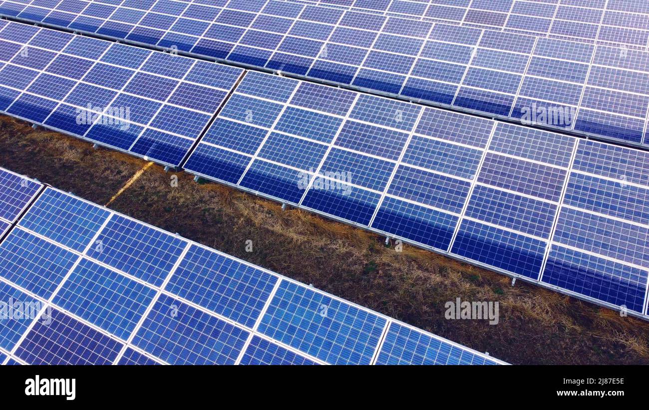 Aerial drone view flight over solar power station panels. Aerial top ...