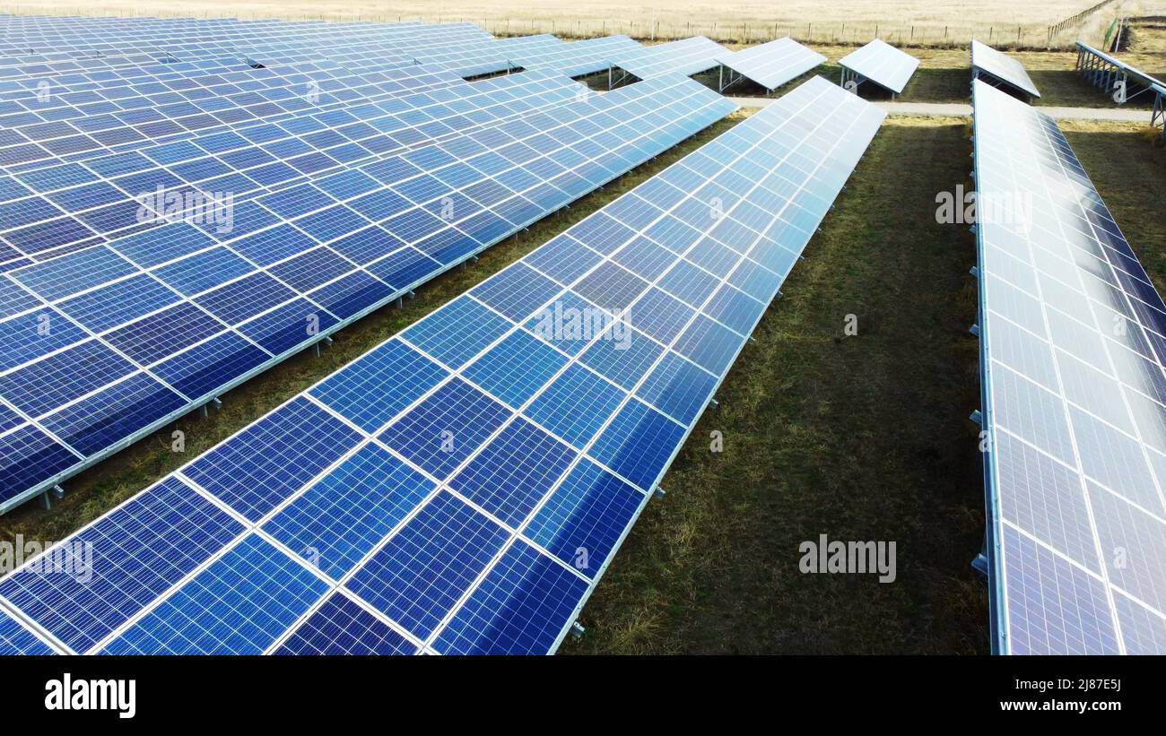 Aerial drone view flight over solar power station panels. Aerial top ...