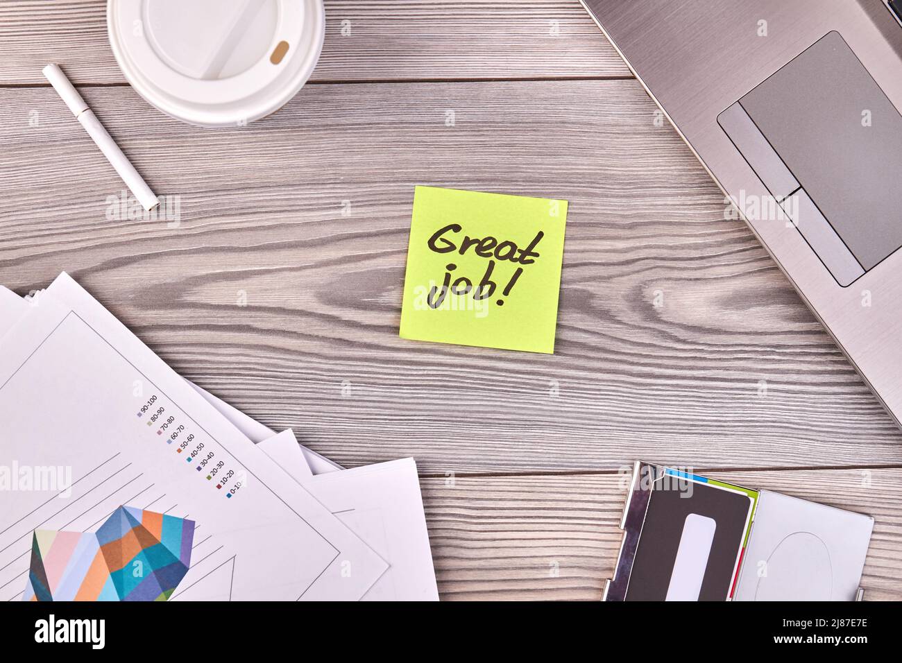 Office worker wordesk with great job handwriting. Top view flat lay ...