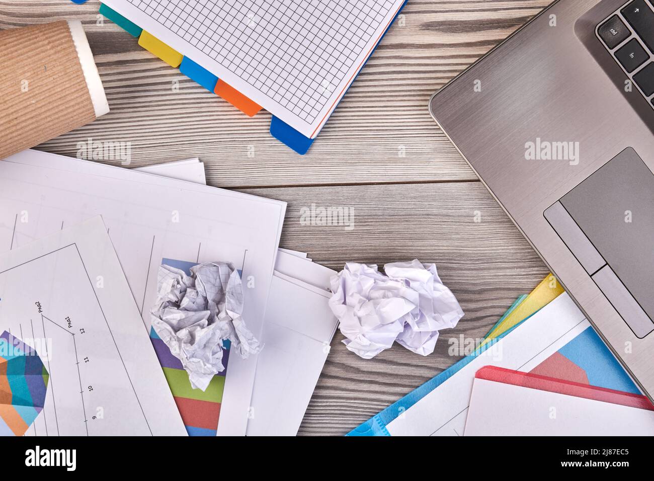 Office desk stuff top view flat lay. Many work papers with laptop pc ...