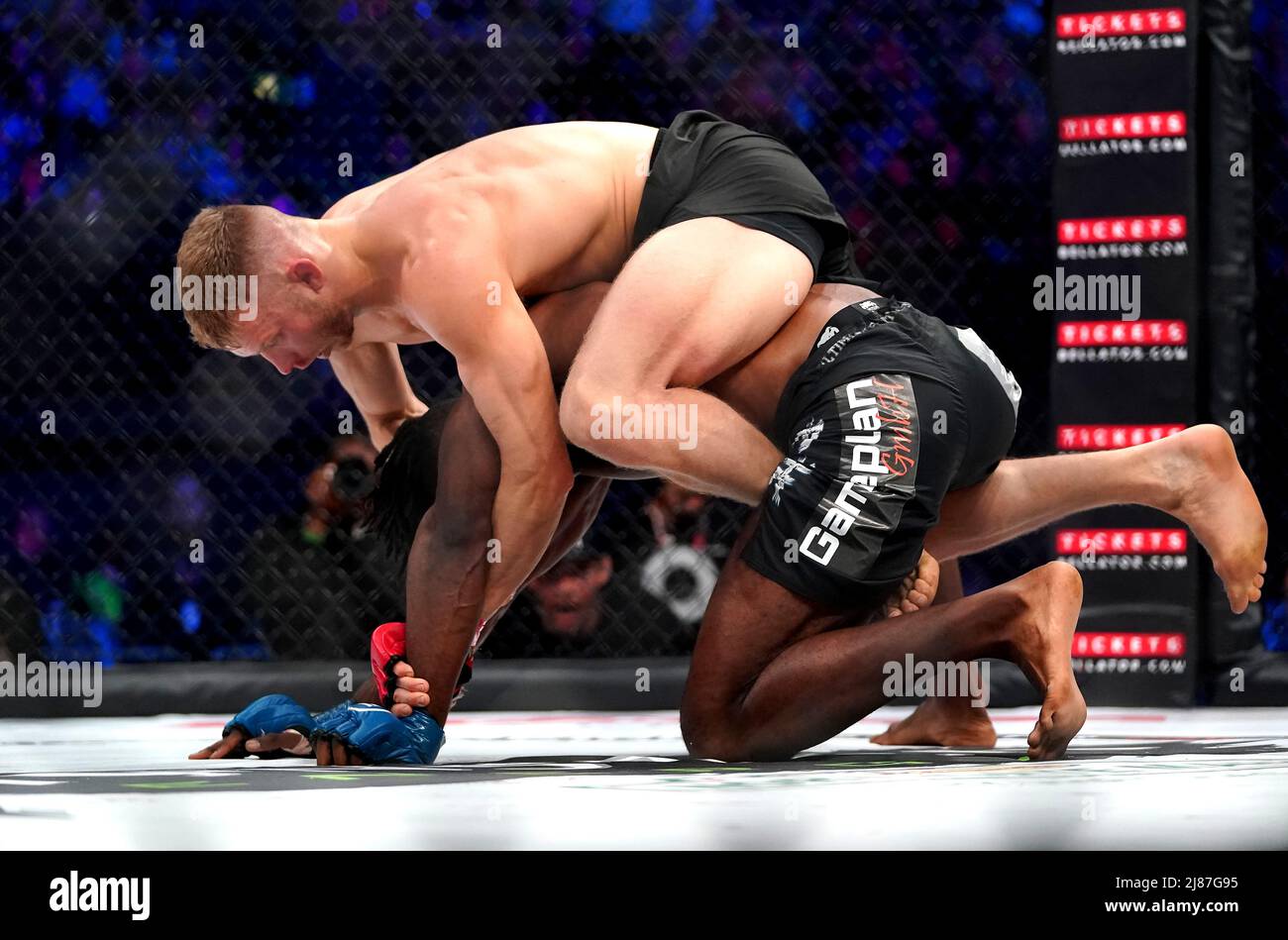 Luke Trainer (top) and Simon Biyong in action during the light ...