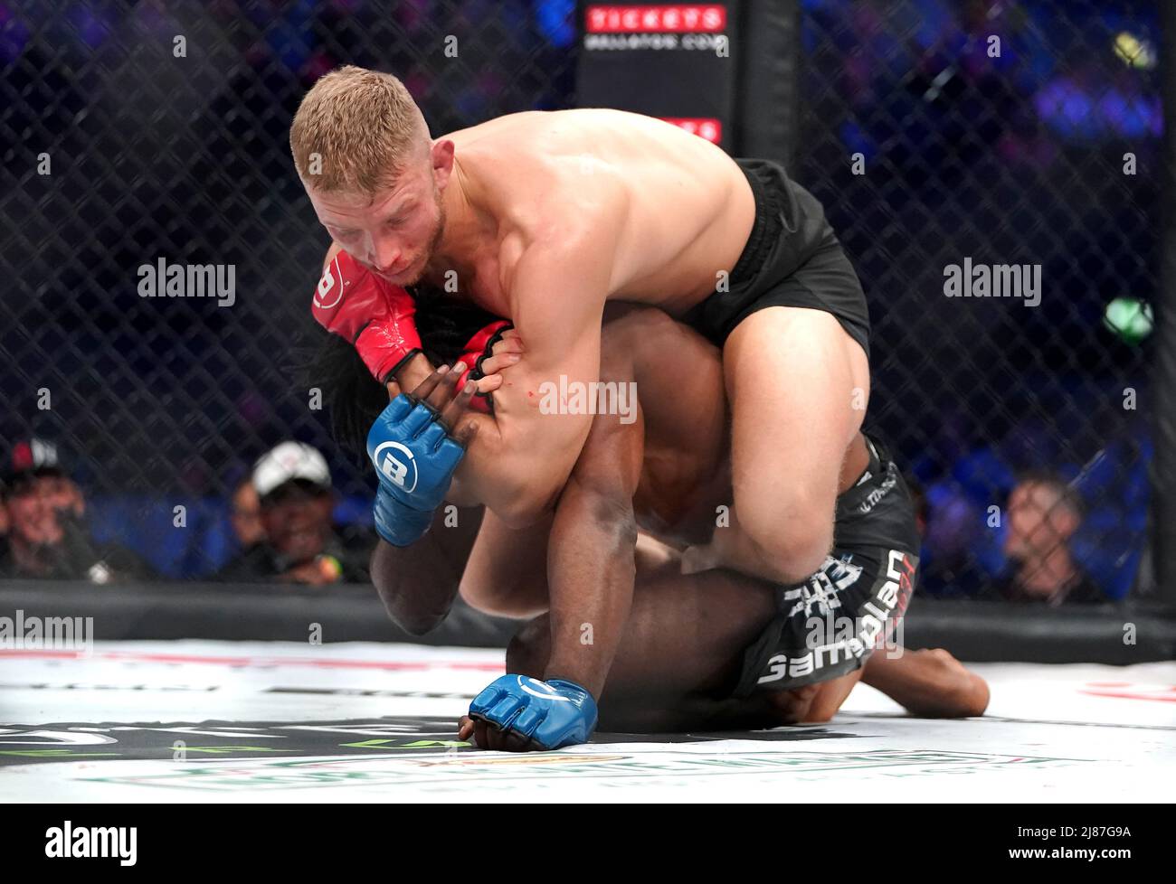 Luke Trainer (top) and Simon Biyong in action during the light ...