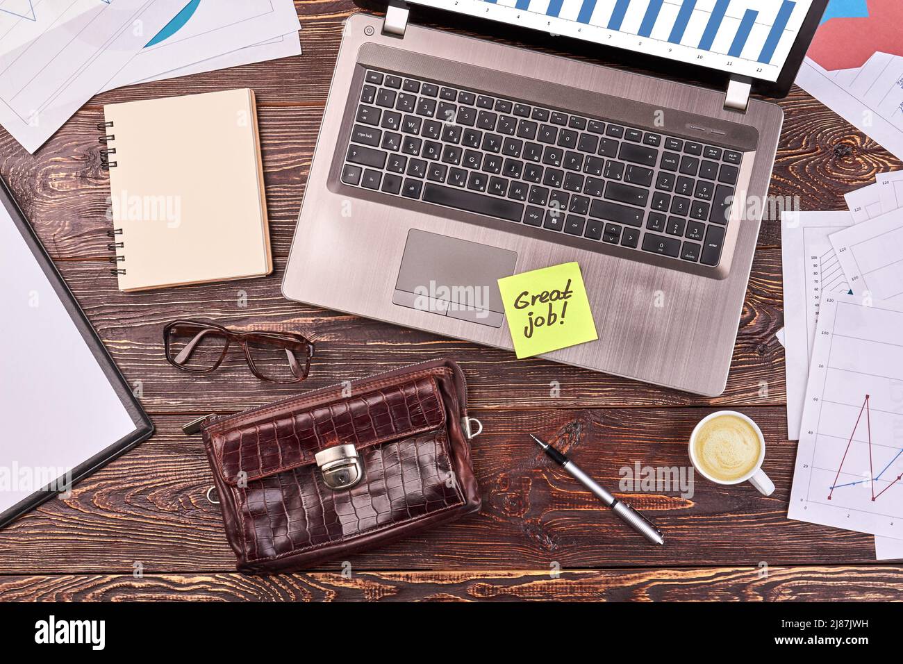 Top view flat lay office stuff and sticky note with great job ...