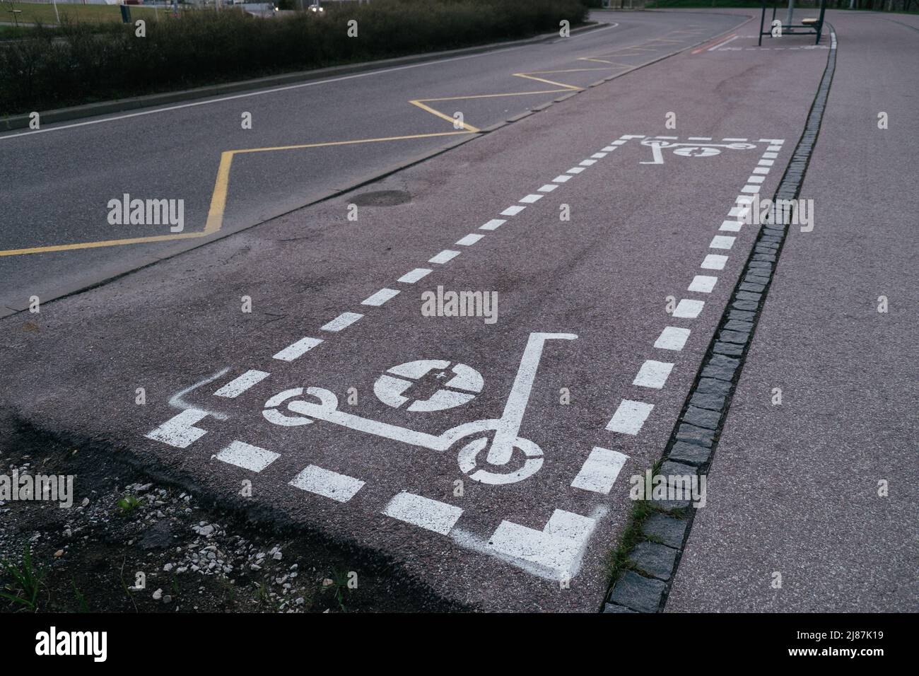 Dedicated electric scooter parking spot sign spray painted on city ...