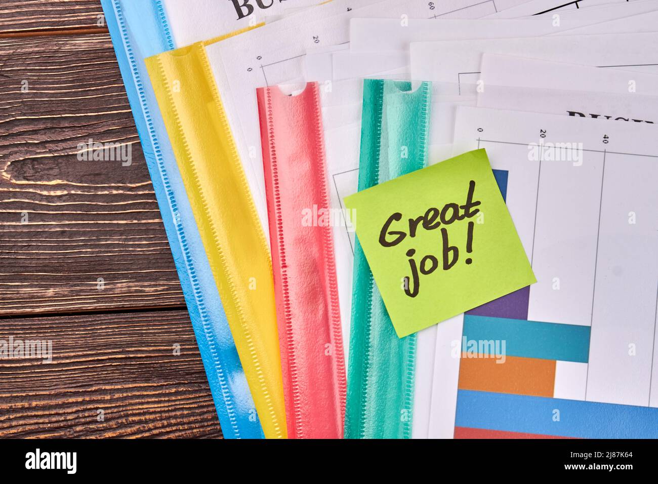 Folders with diagram charts statistic on brown wood. Top view flat lay ...