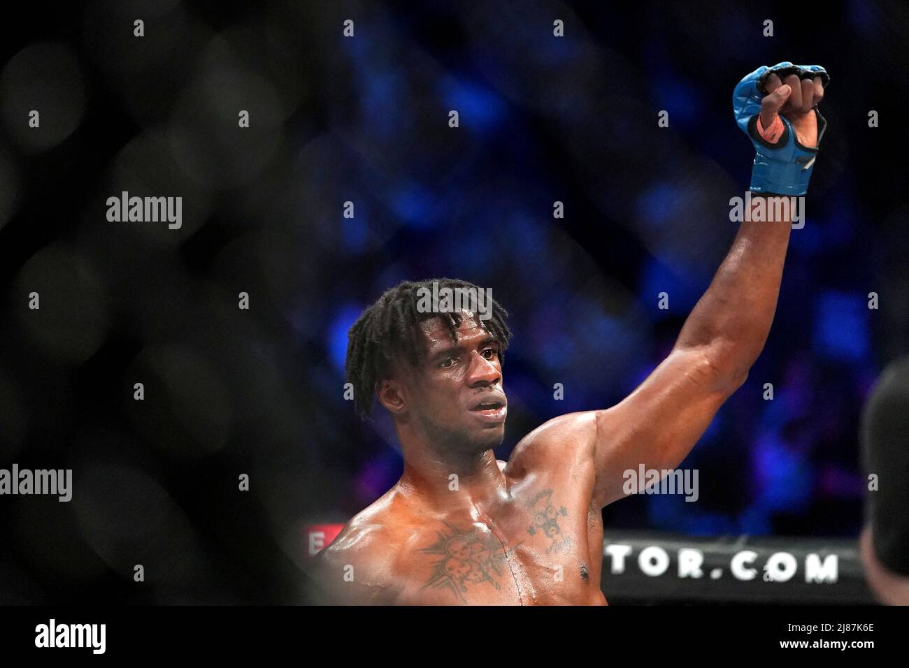 Simon Biyong celebrates victory after the light heavyweights fight at ...