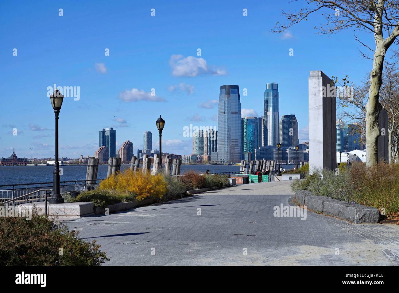 Waterfront path in Battery Park, New York City, with view of Jersey ...