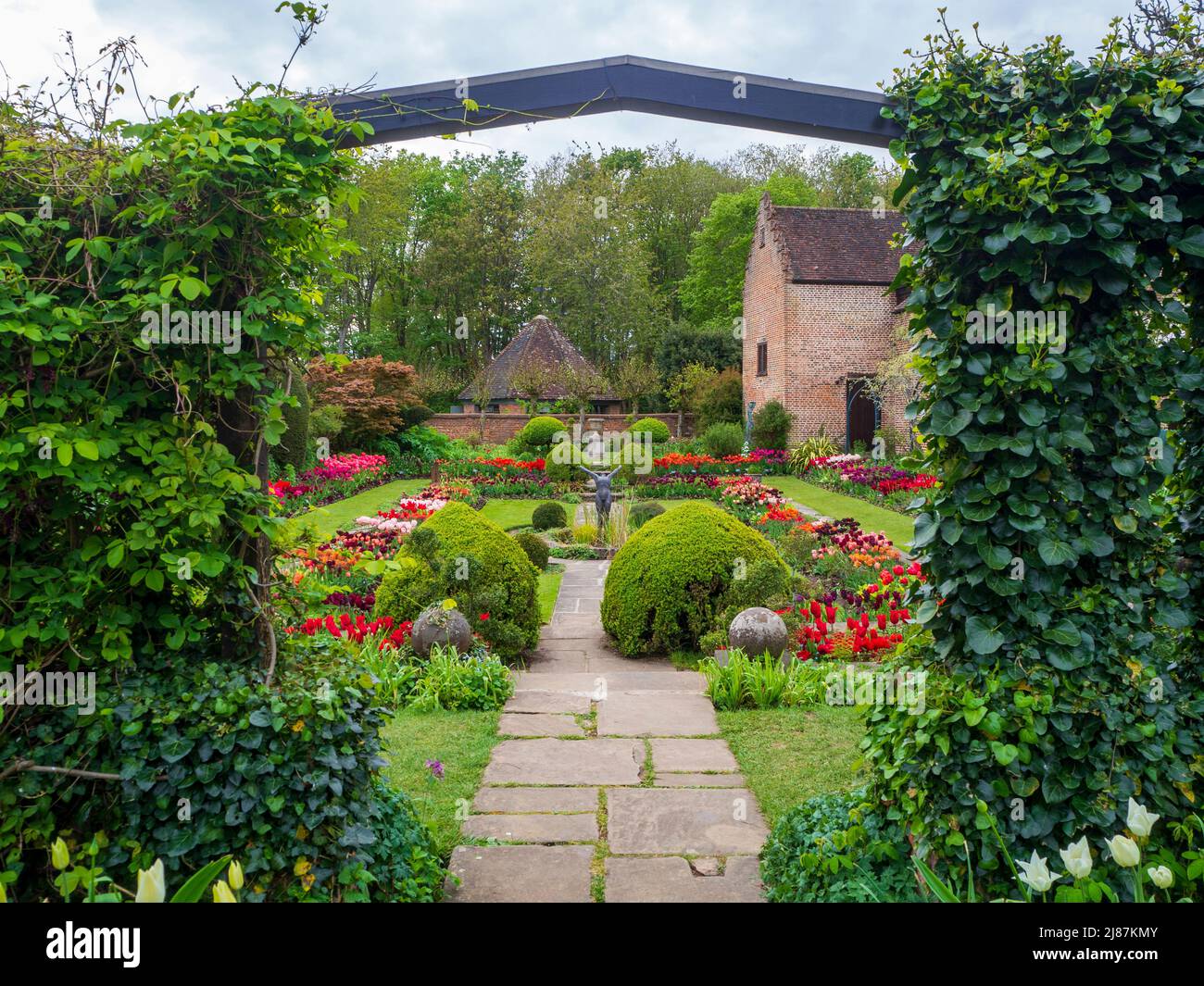 Chenies Manor Garden Sunken garden at Tulip season.Overcast weather ...