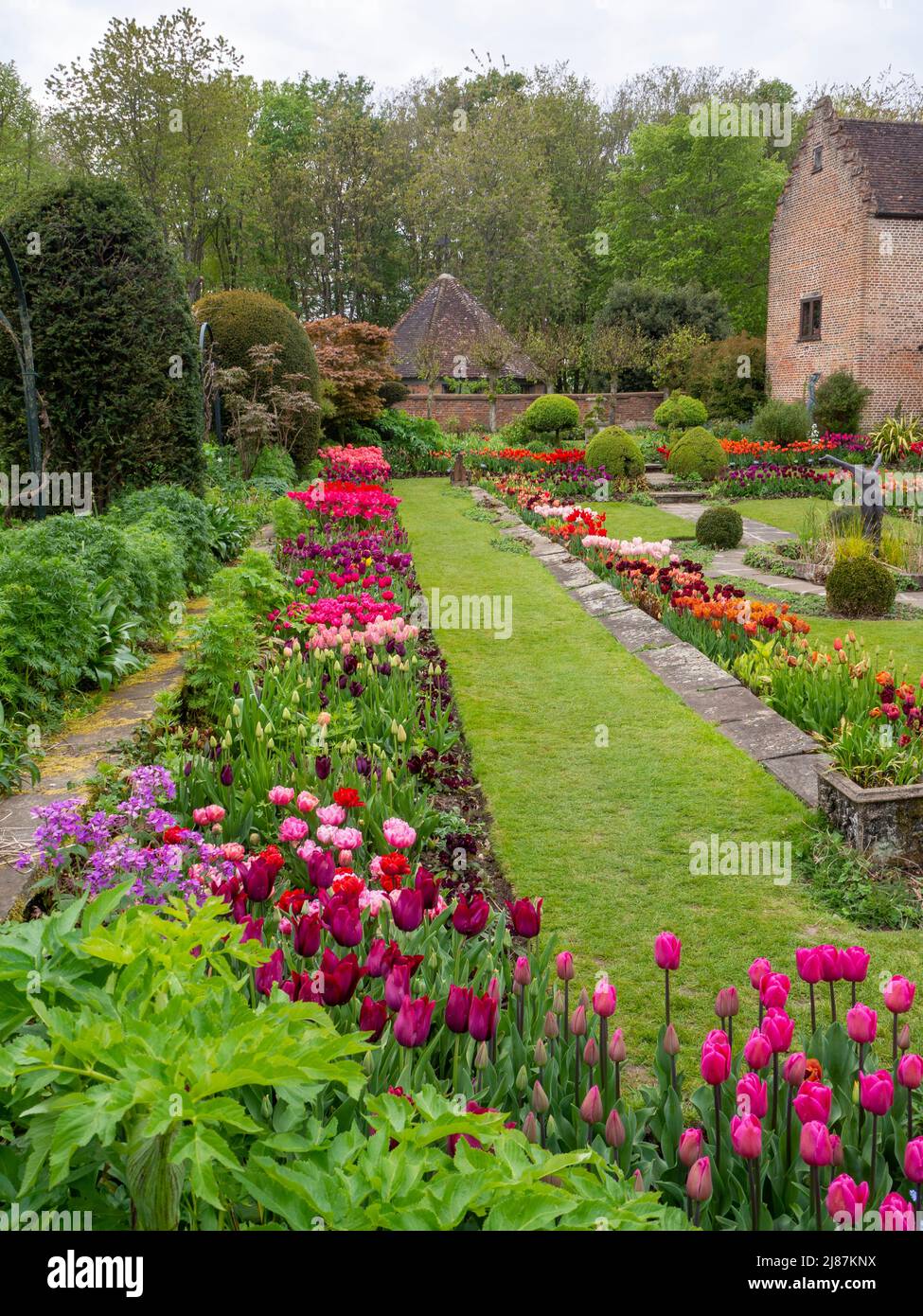 Chenies Manor Garden Sunken garden at Tulip season.Overcast weather ...