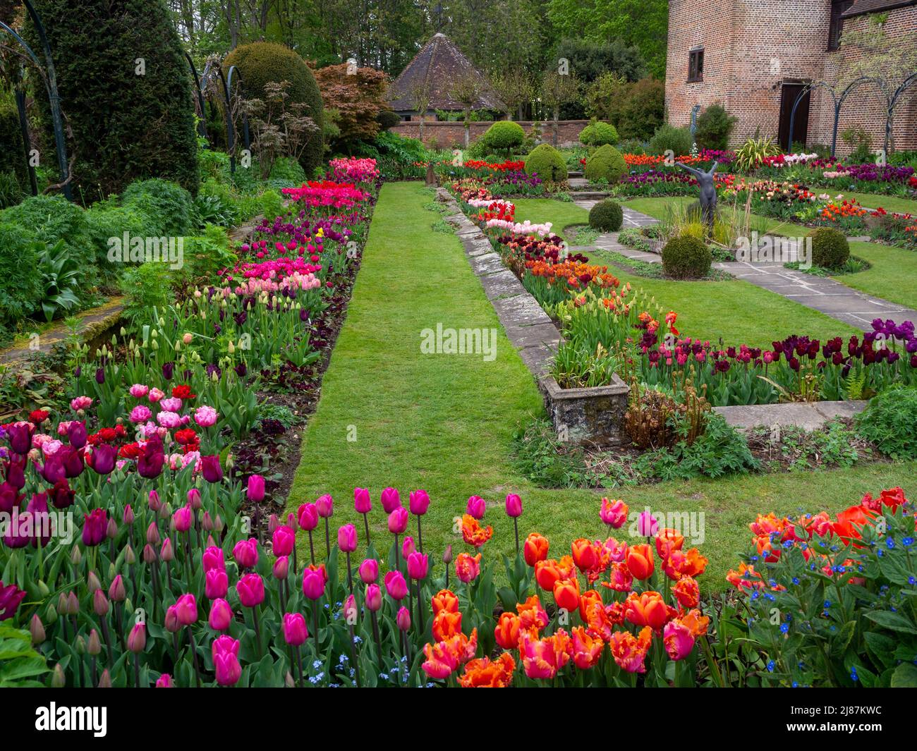Chenies Manor Garden Sunken garden at Tulip season.Overcast weather ...