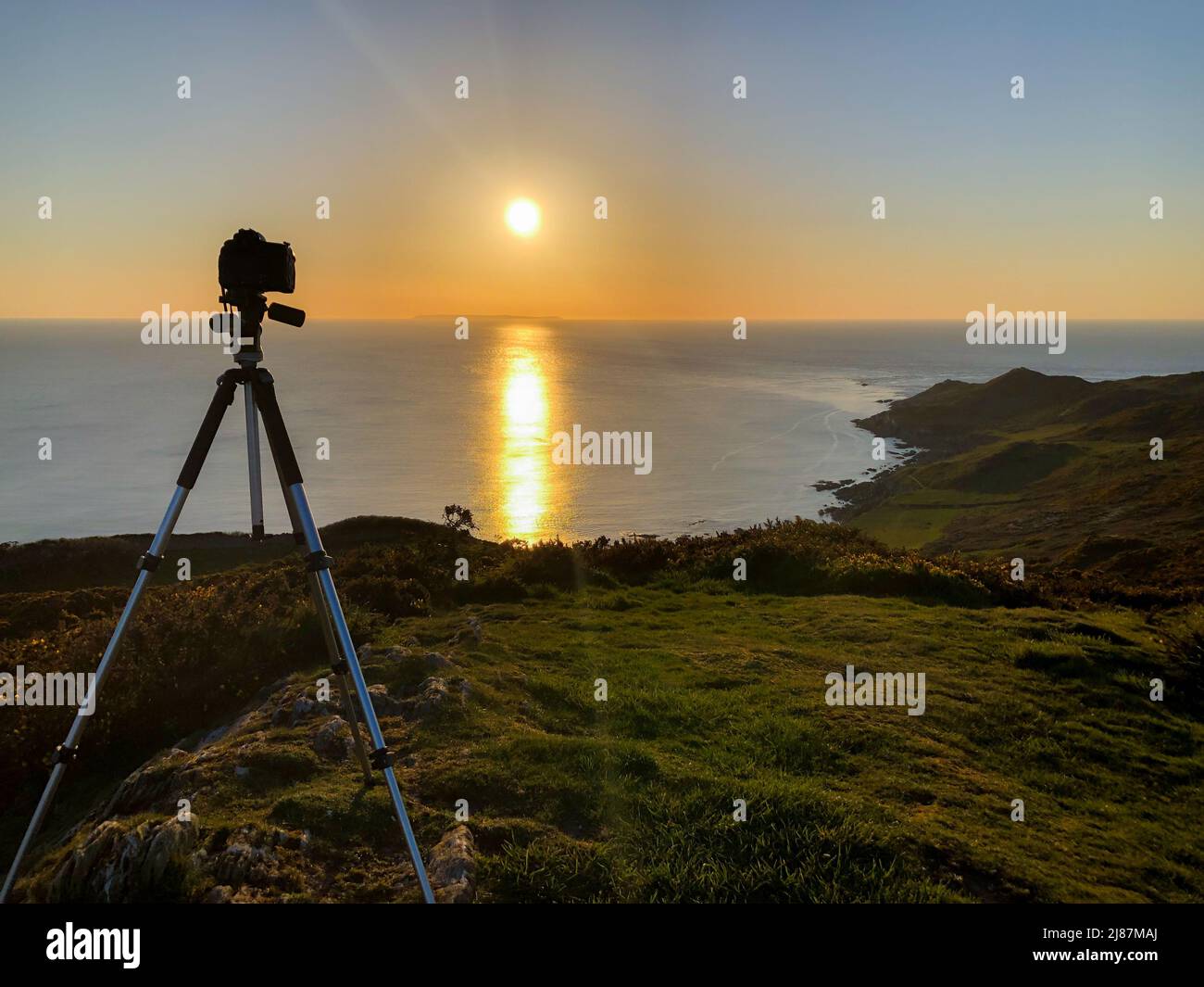 Photographer camera setup taking a picture of landscape Stock Photo - Alamy