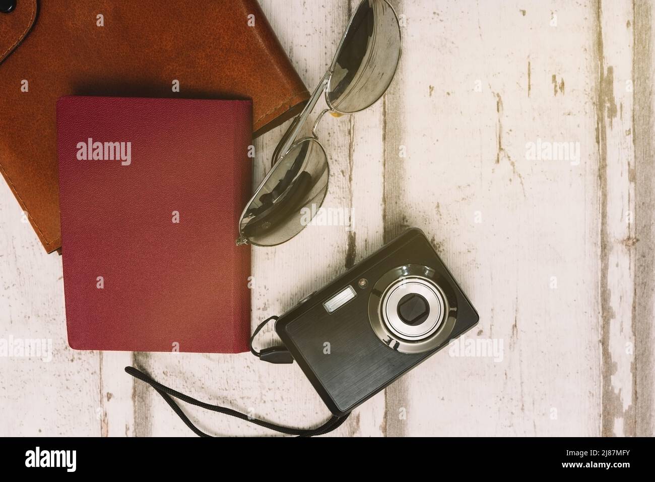 top view still life travel. Light wood background. Personal documents ...