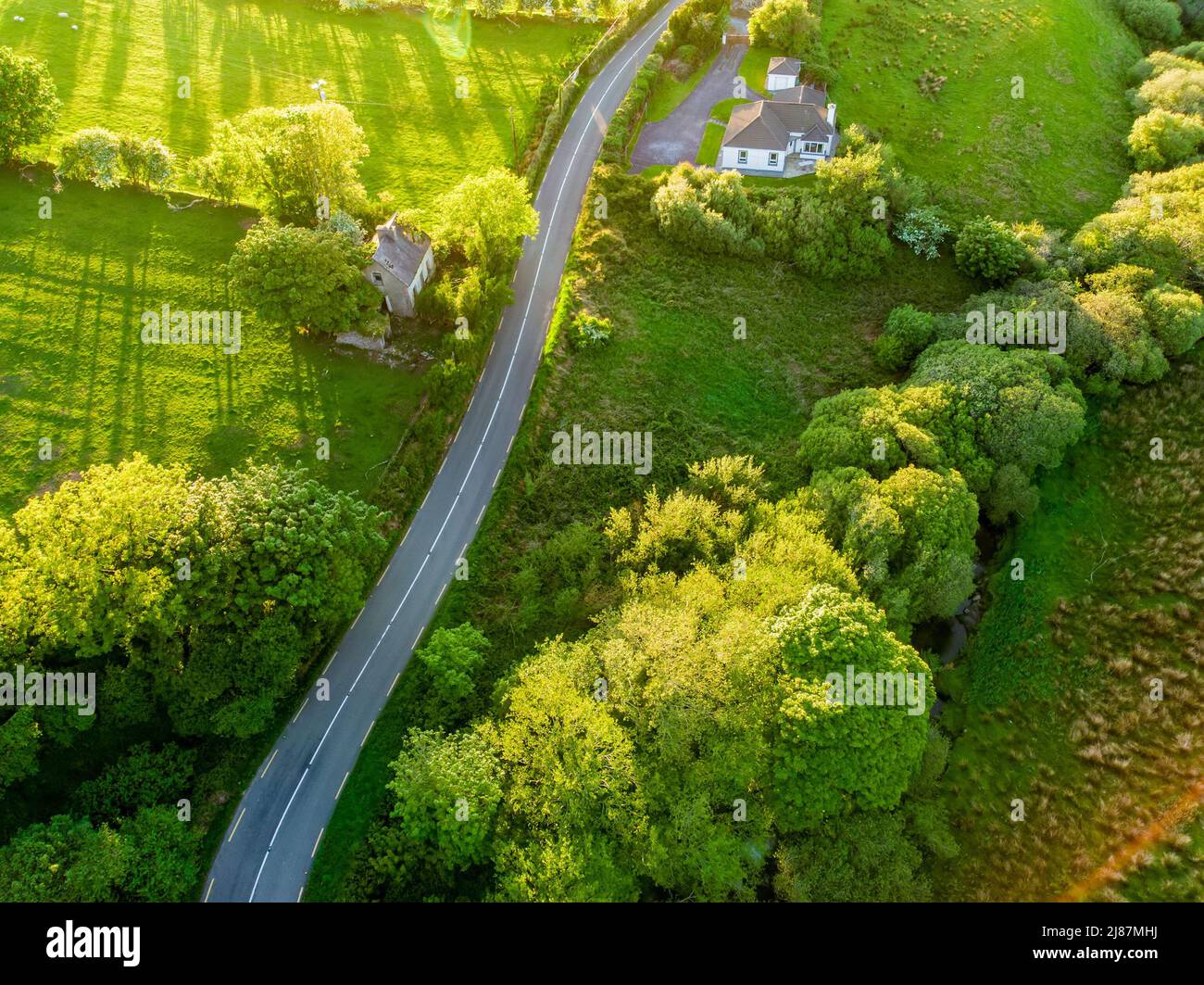 Aerial view of endless lush pastures and farmlands of Ireland ...