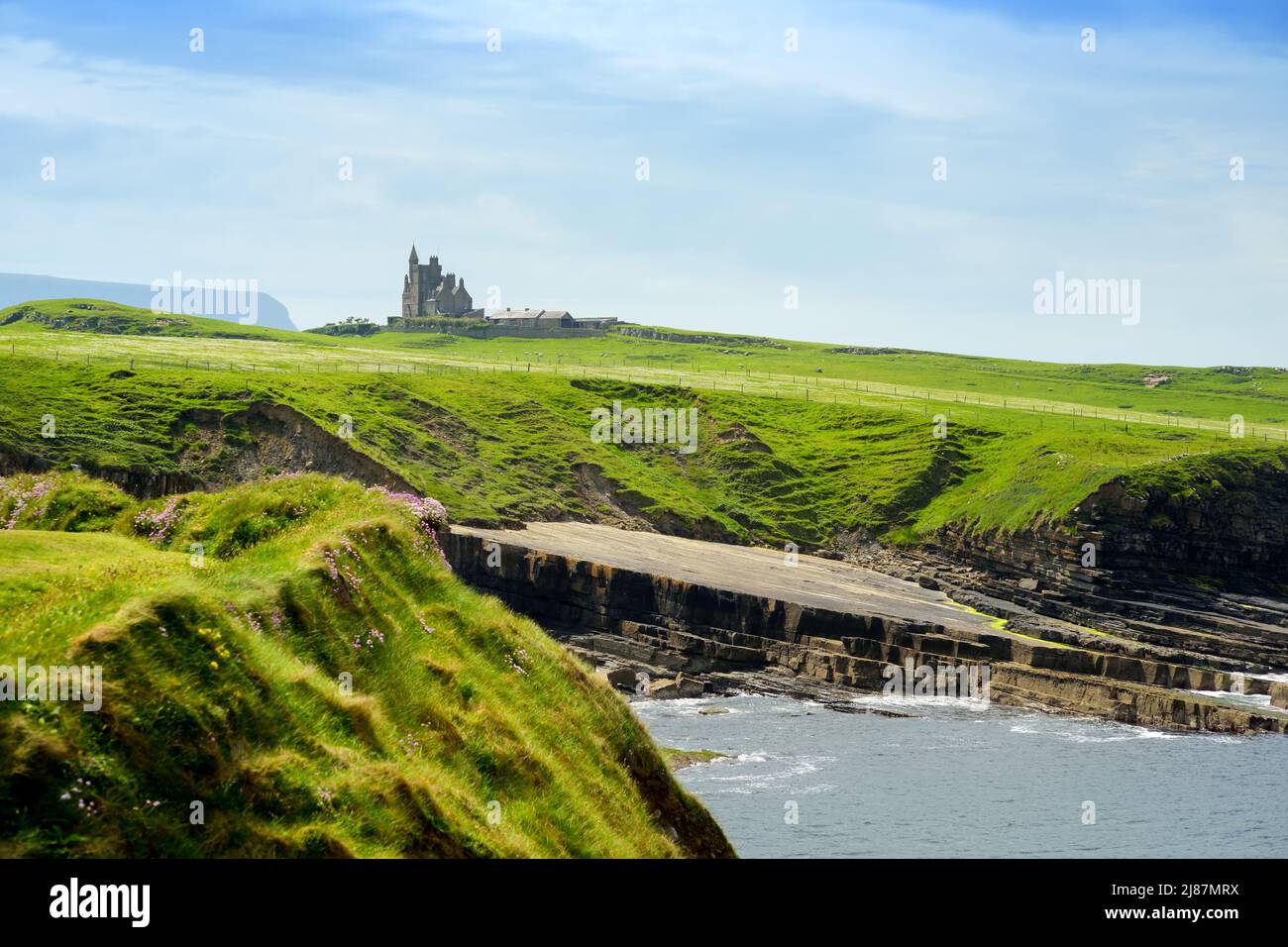 Spectacular view of Mullaghmore Head with huge waves rolling ashore ...