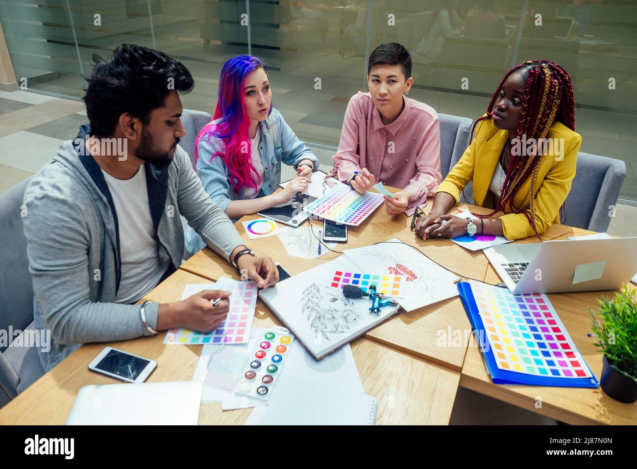 creative agency designer team working together:african american woman ...