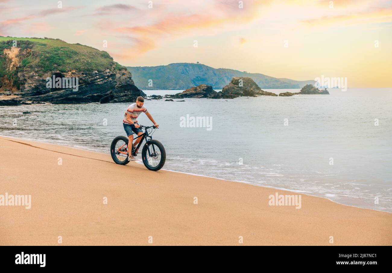 Fat man on a beach hi-res stock photography and images - Alamy